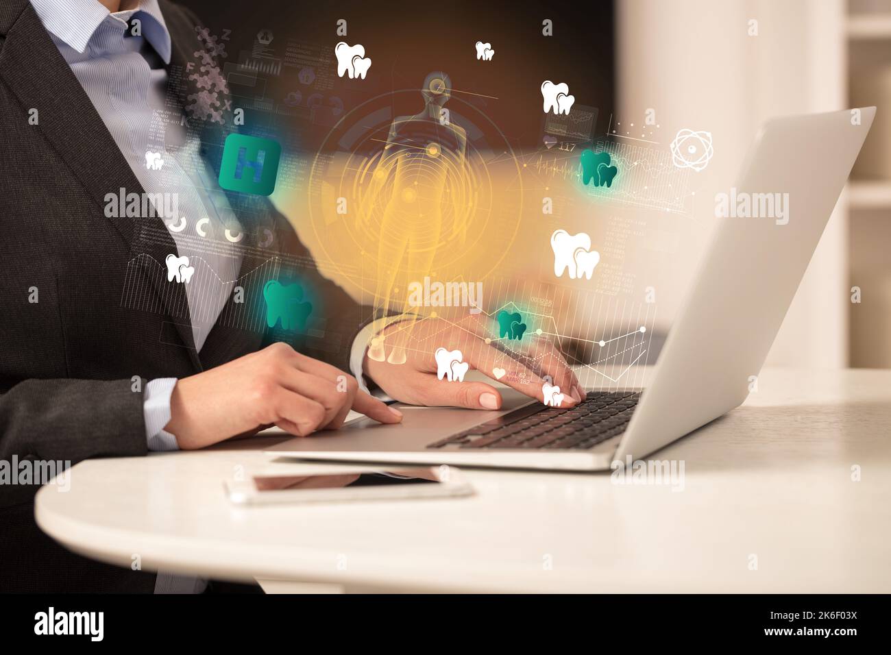 Doctor working on laptop with healthcare concept Stock Photo - Alamy