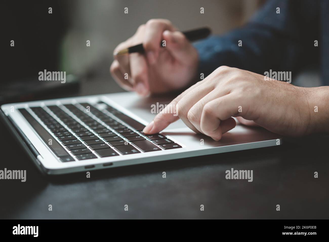 Close up man working and typing on laptop computer keyboard Work from ...
