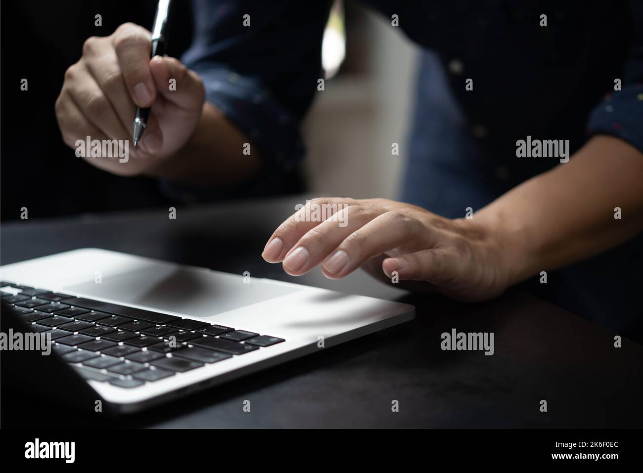 Close up man working and typing on laptop computer keyboard Work from ...