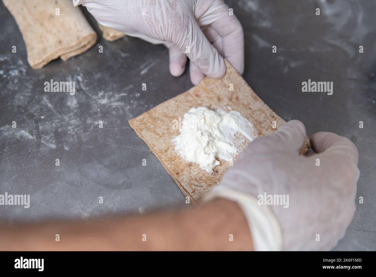 Young Pastry Chef Making Some Sweet Snack in the Bakery Cooking Process ...