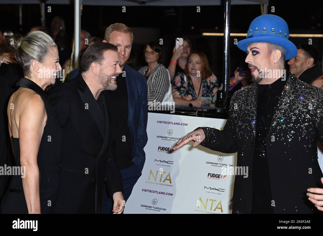 October 13th, 2022. London, UK. Ricky Gervais, Jane Fallon and Boy ...