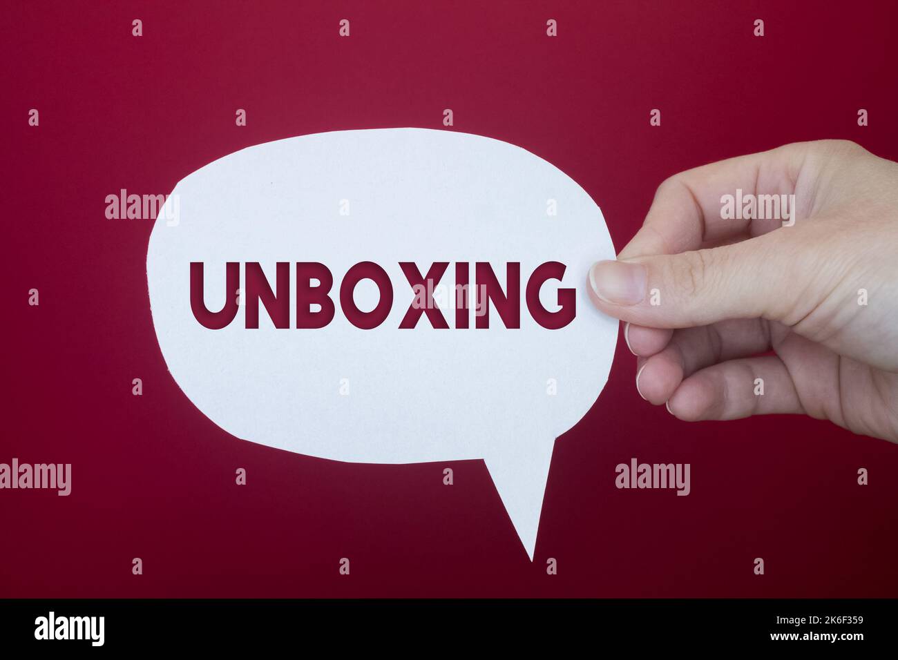 Speech bubble in front of colored background with Unboxing text Stock ...