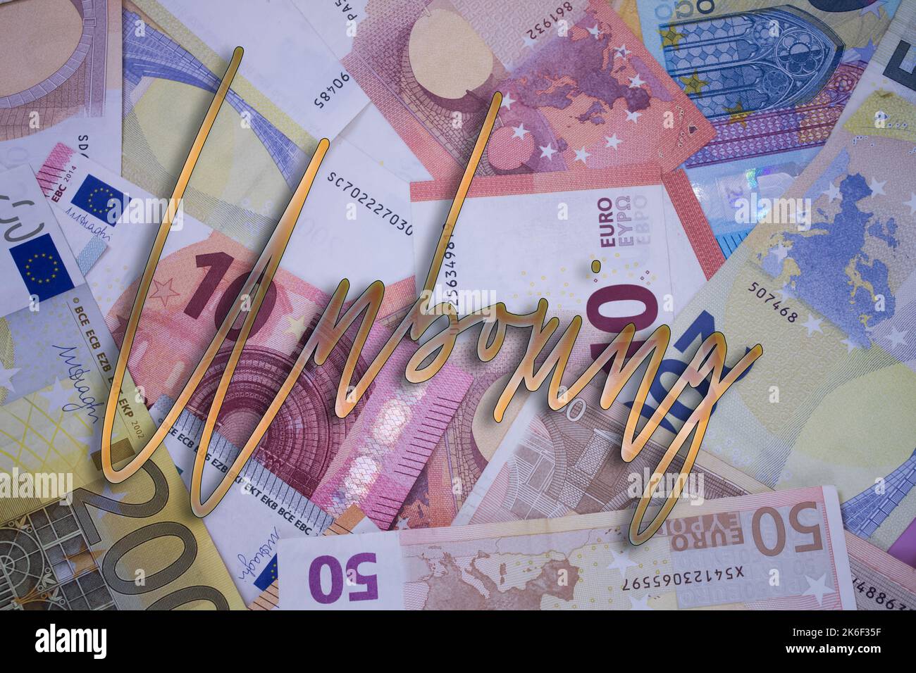 Unboxing word with money. Paper currency background with different ...