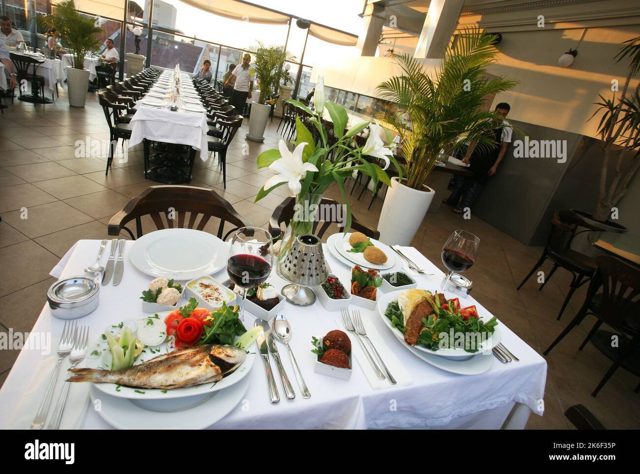 ISTANBUL, TURKEY - JULY 9: Perch fish, Turkish Kebab and appetizer ...