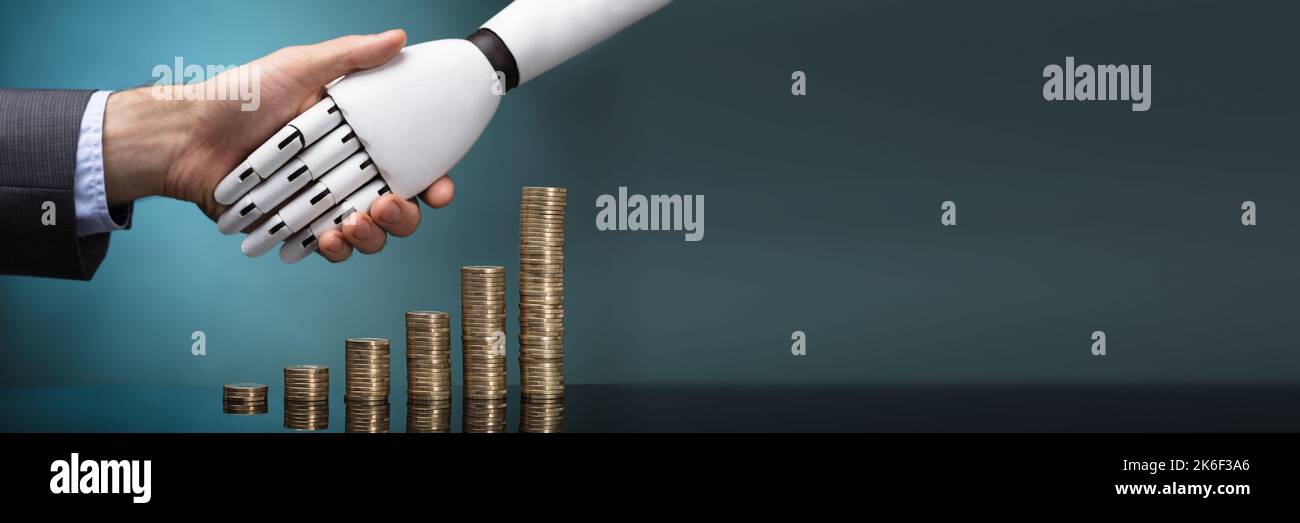 AI Robot Money Saving Handshake And Business Trading Stock Photo - Alamy