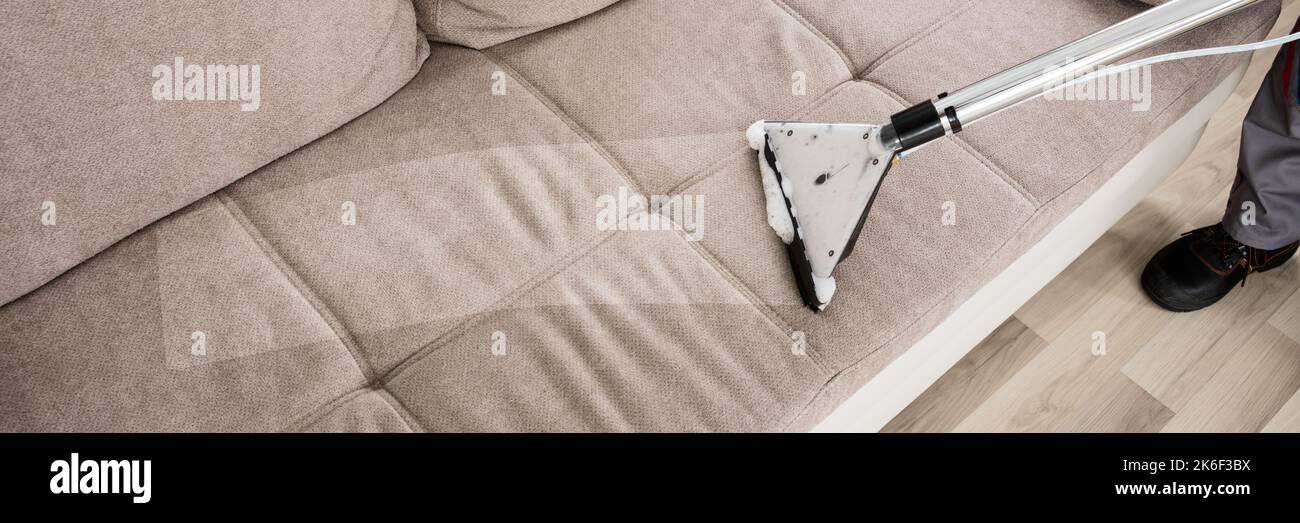 Couch Vacuum Cleaning Service. Professional Sofa Cleaner Stock Photo ...