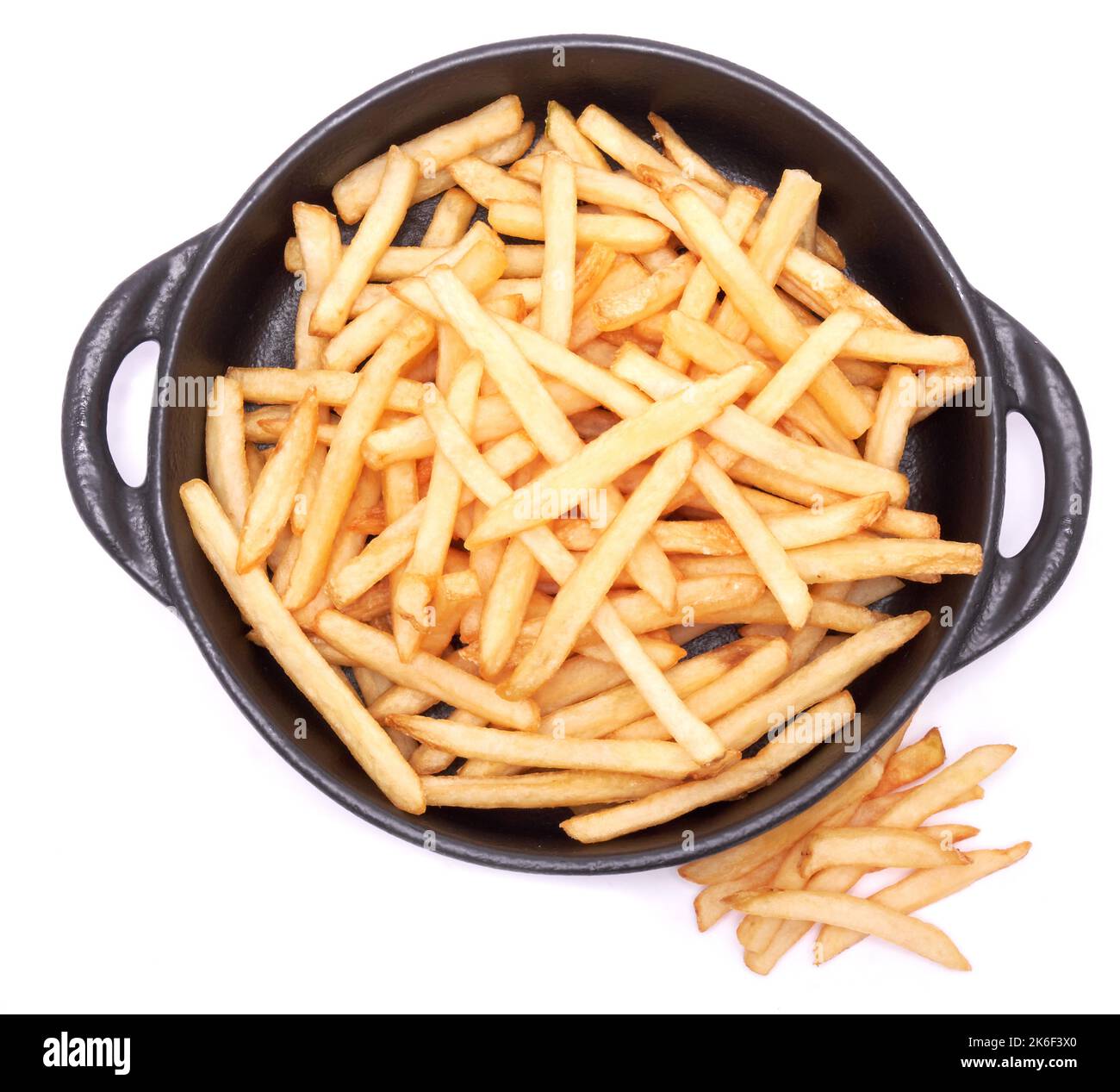 French fries potatoes in black ceramic bowl isolated on white ...