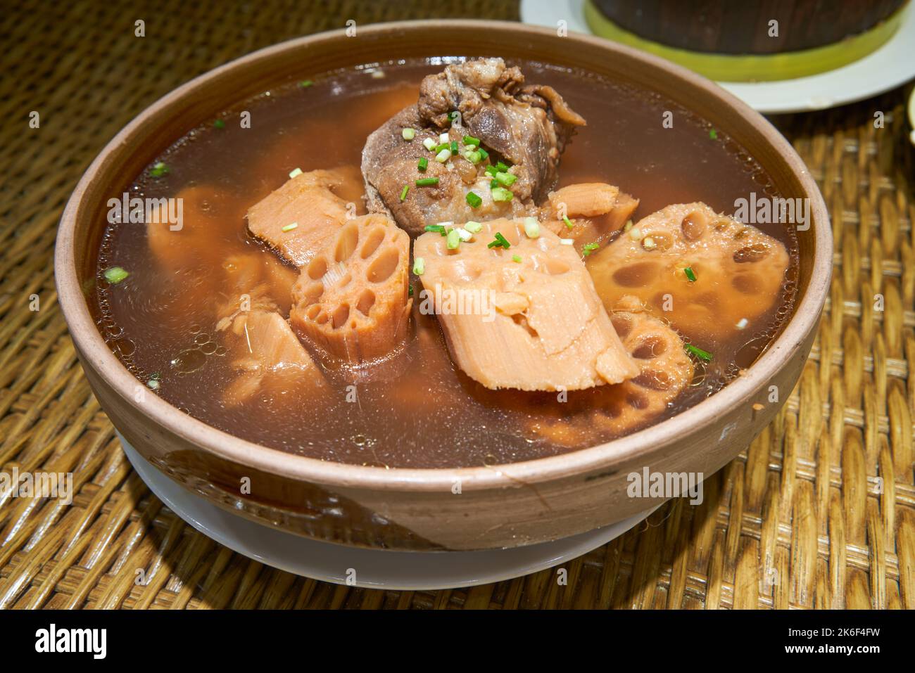 A delicious traditional Chinese dish, lotus root pork ribs soup Stock ...