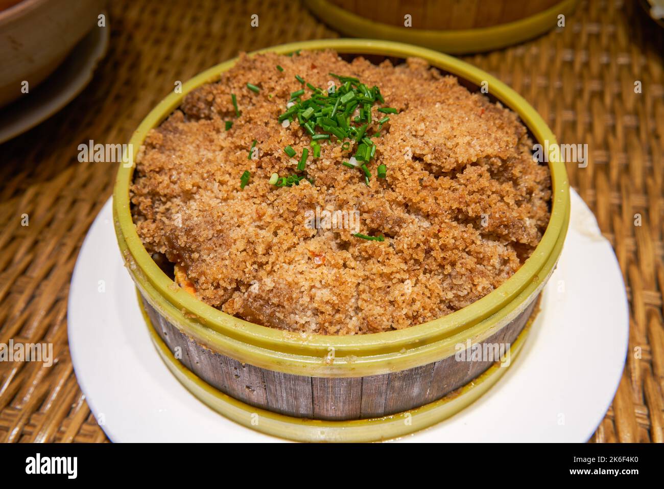 A delicious traditional Guilin dish, steamed pork with rice powder ...