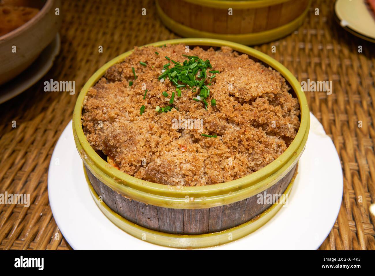 A delicious traditional Guilin dish, steamed pork with rice powder ...