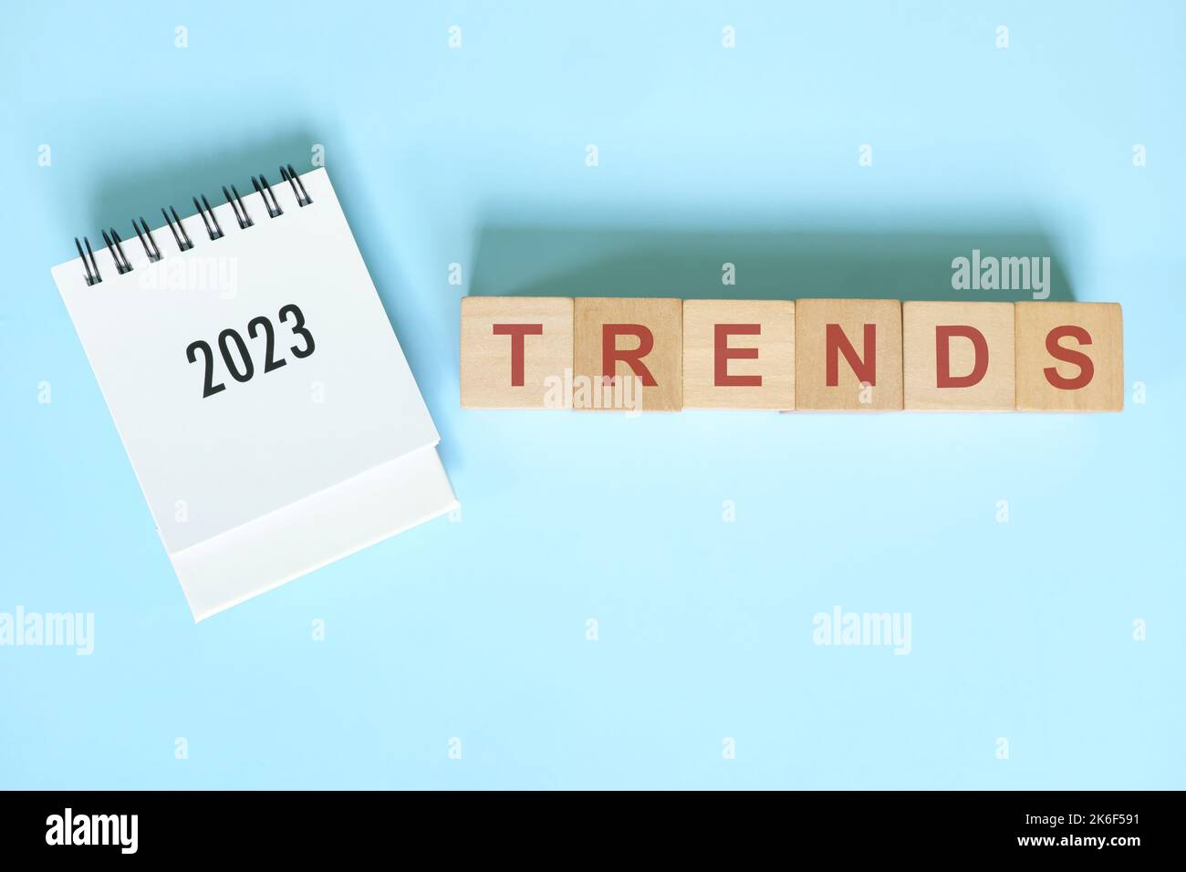 New year 2023 new trends concept. Desk calendar flat lay in blue ...