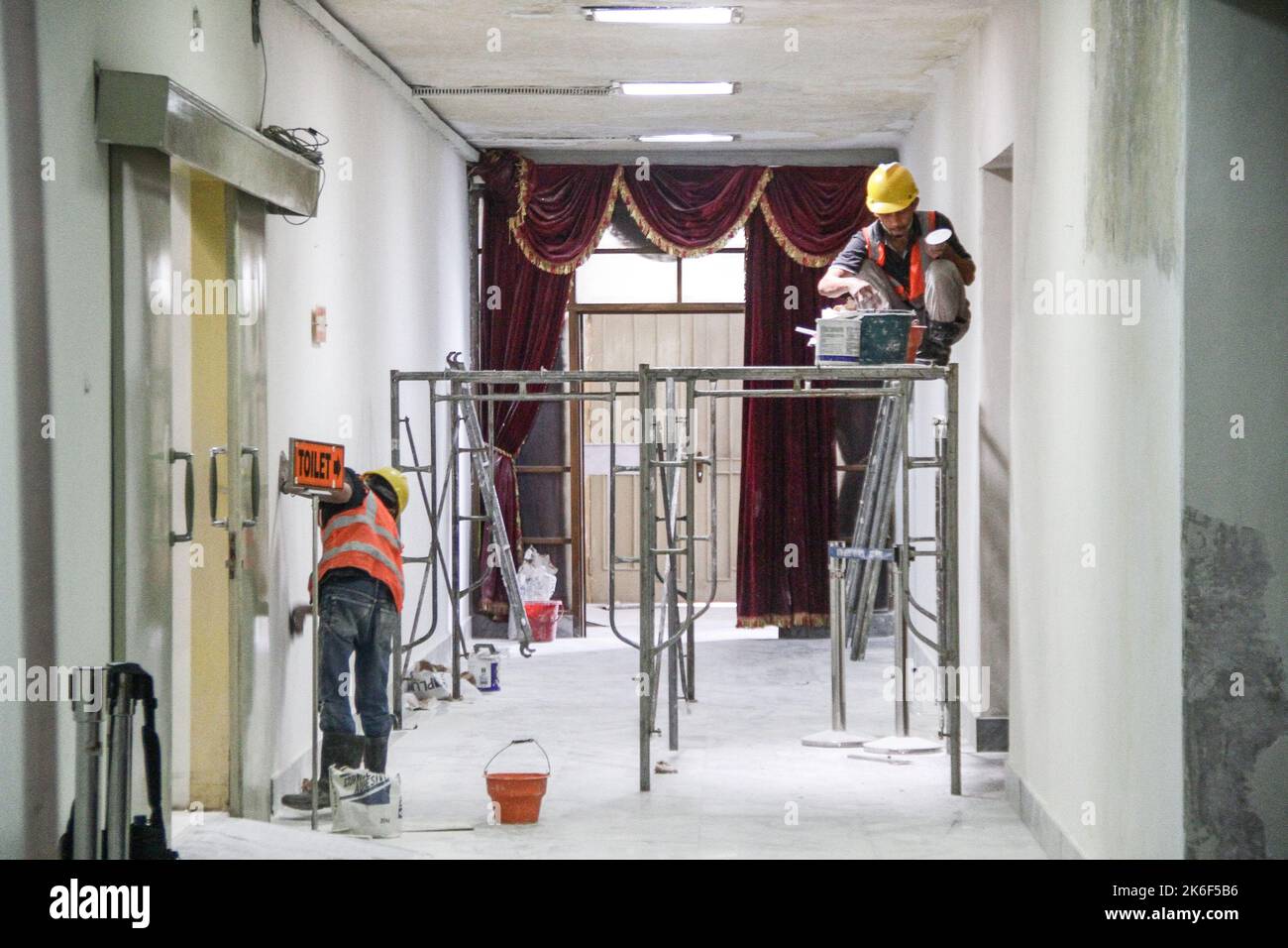 Bandung, West Java, Indonesia. 14th Oct, 2022. Workers are seen repairing Merdeka Building or ...