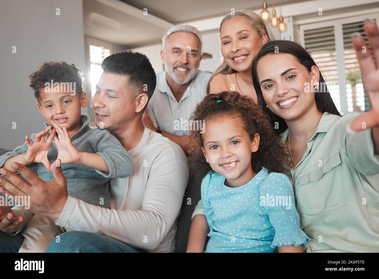 A branch off our family tree. a family taking a selfie together at home ...