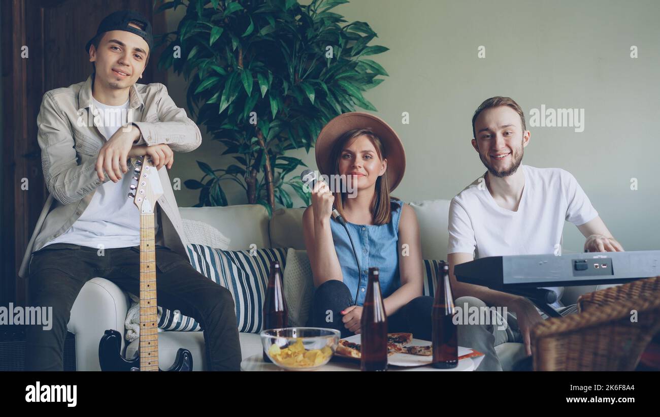 Portrait of cheerful young people professional musicians female ...