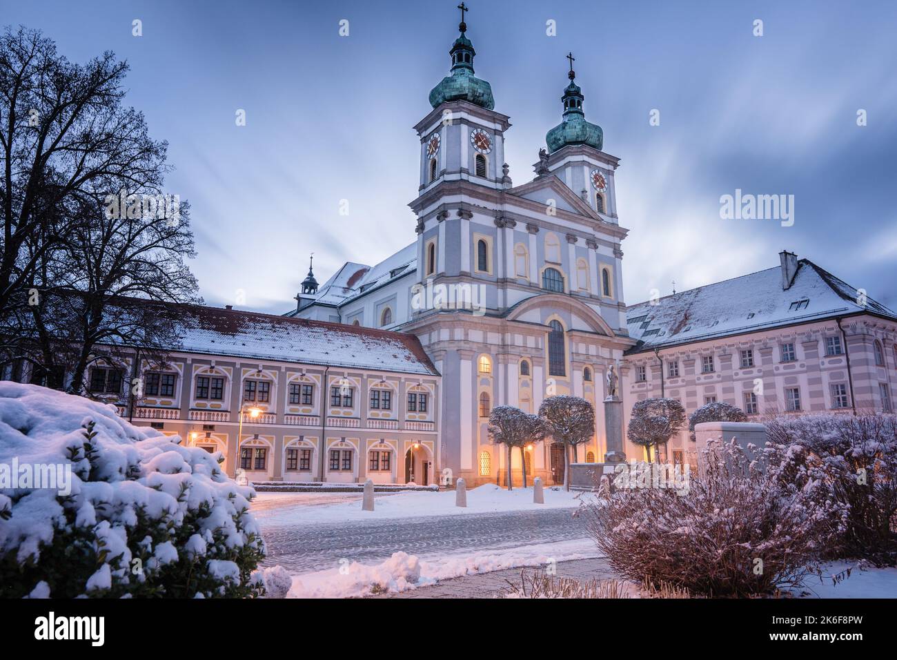 A view of basilica cathederal building facade in snowy evening in ...