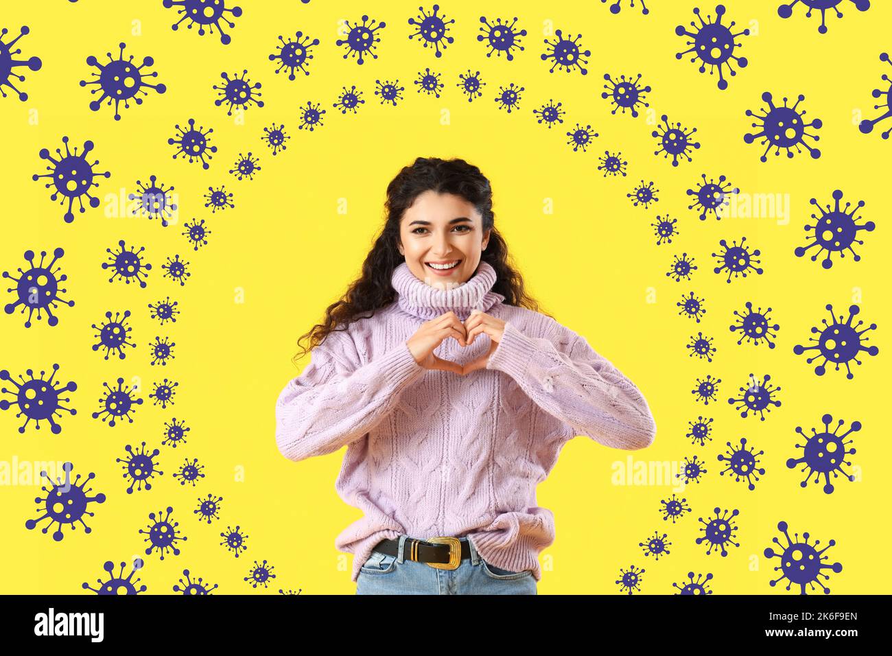 Happy young woman and drawn virus on yellow background. Concept of ...