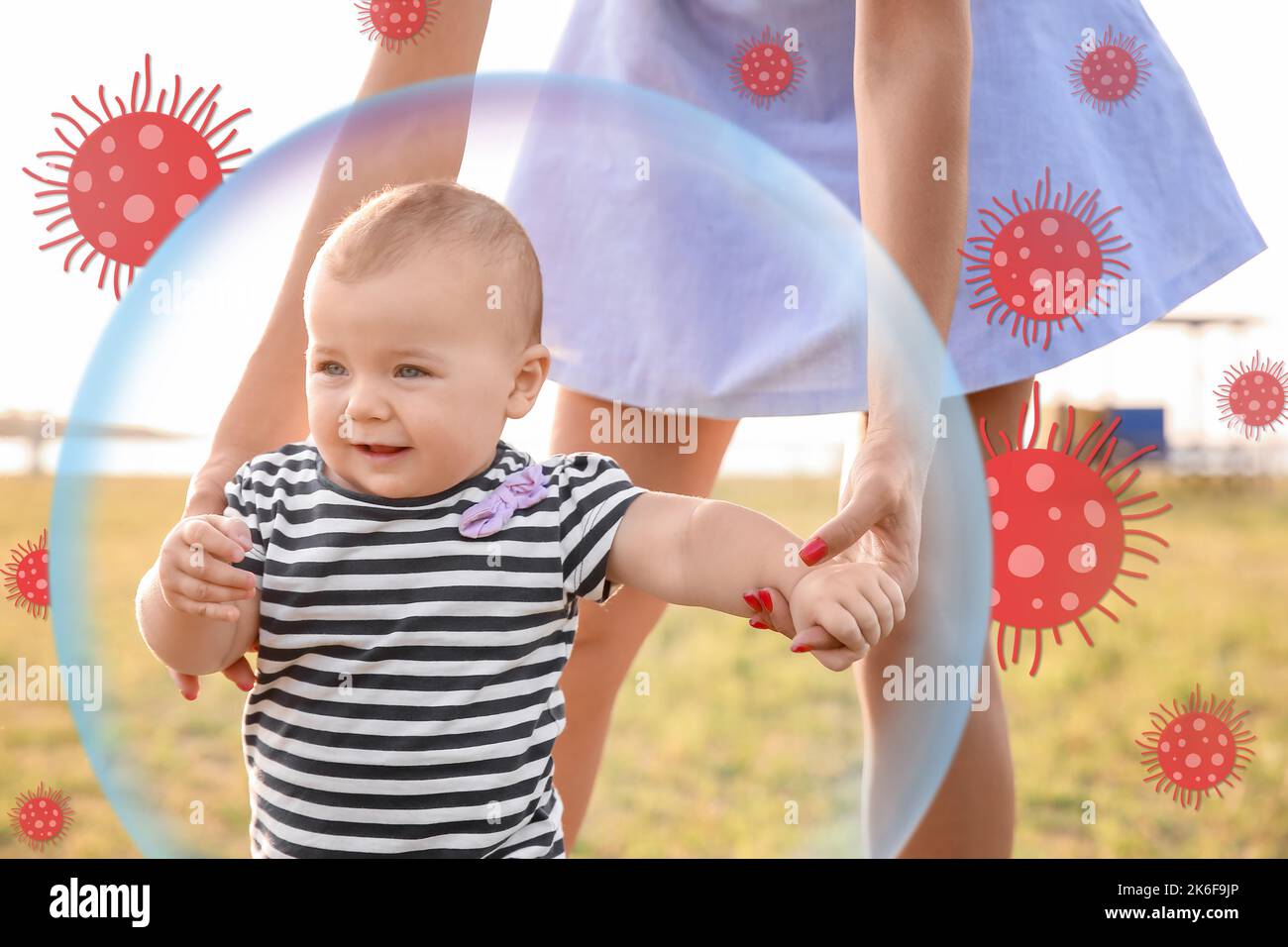 Mother teaching her little baby to walk outdoors. Concept of strong ...