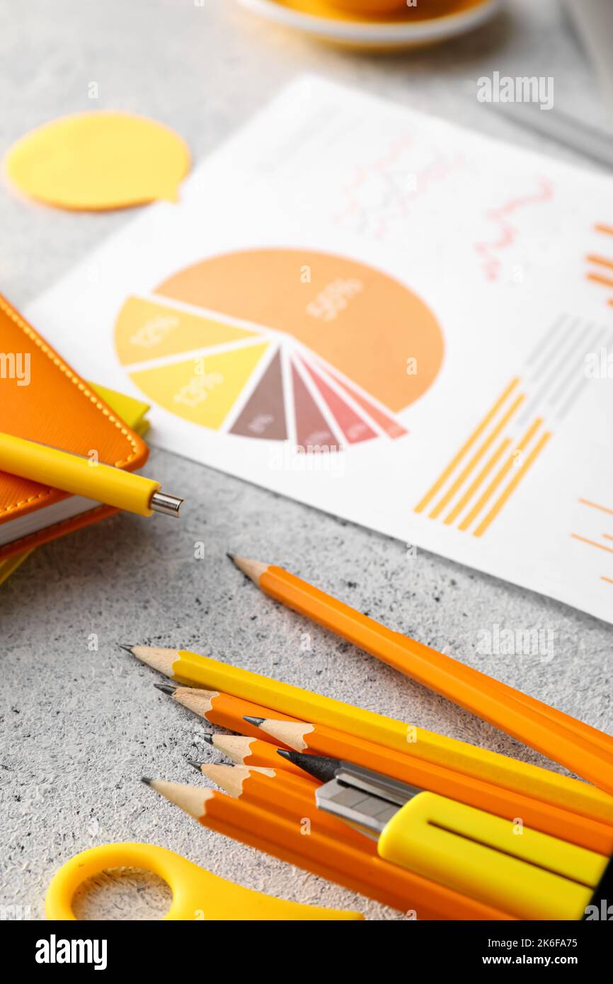 Business charts and stationery on light background Stock Photo - Alamy