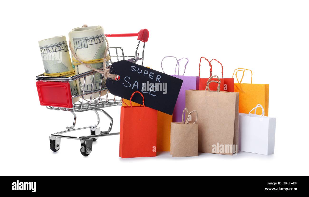 Different paper bags, shopping cart with money and black tag with text ...
