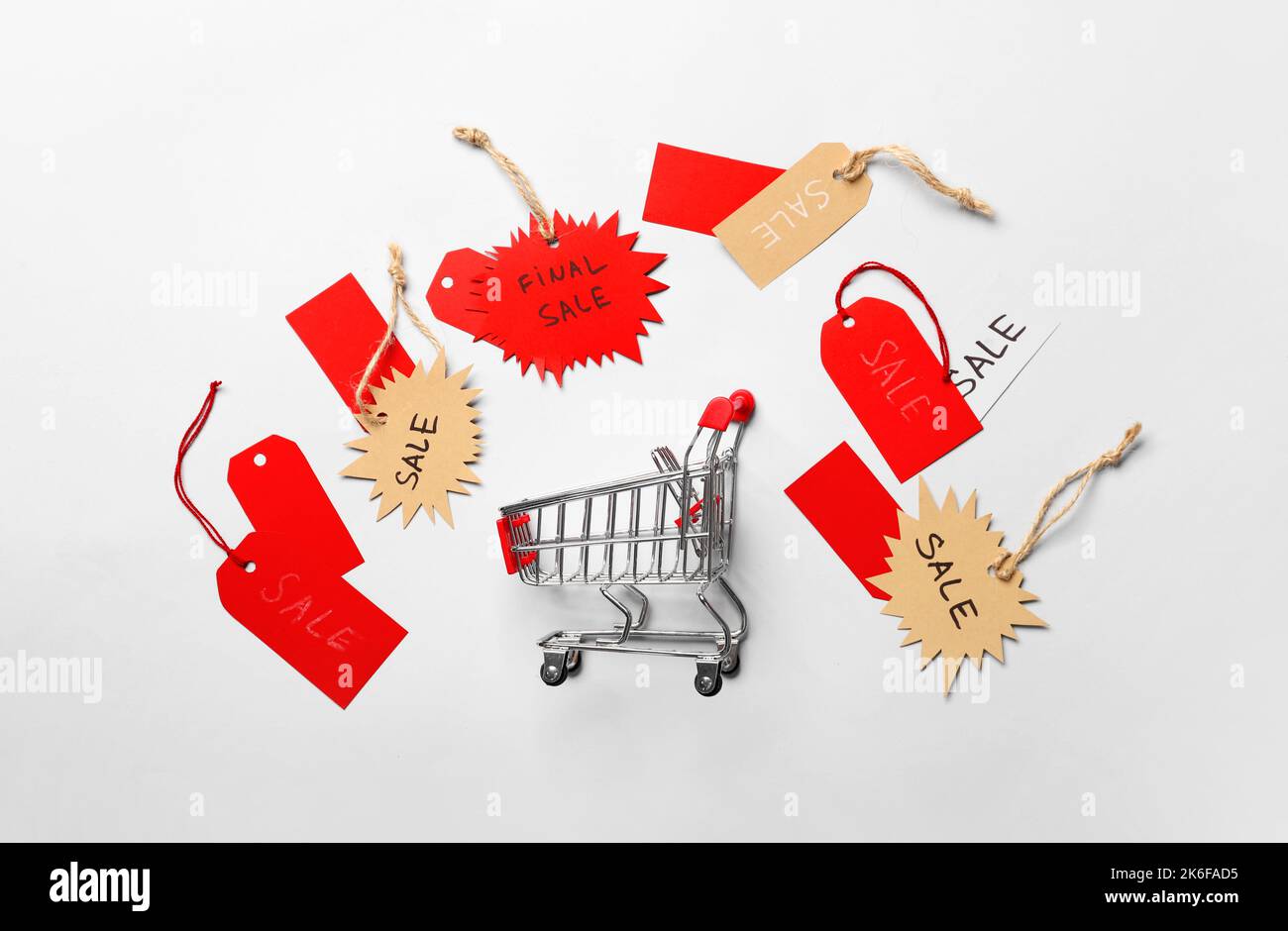 Shopping cart and tags with text FINAL SALE on light background Stock ...