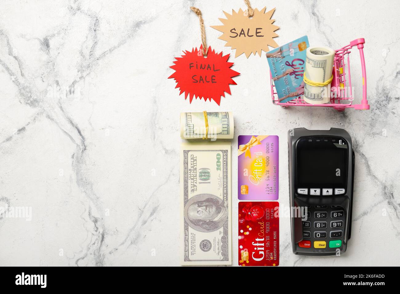 Shopping cart, gift cards, money, payment terminal and tags with text ...