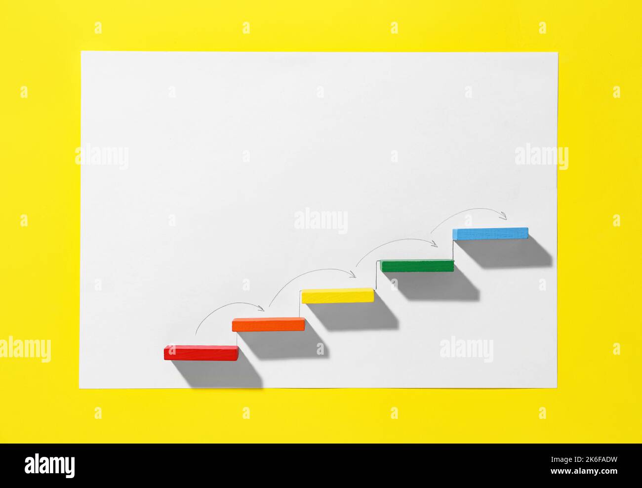Different color blocks on white and yellow background Stock Photo - Alamy