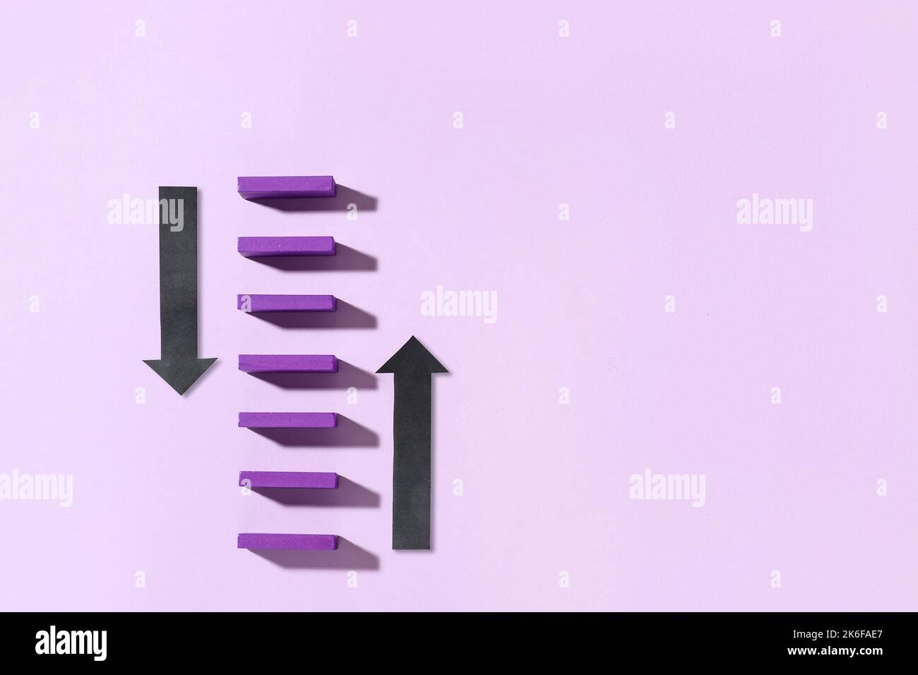Purple blocks and arrows on color background Stock Photo - Alamy
