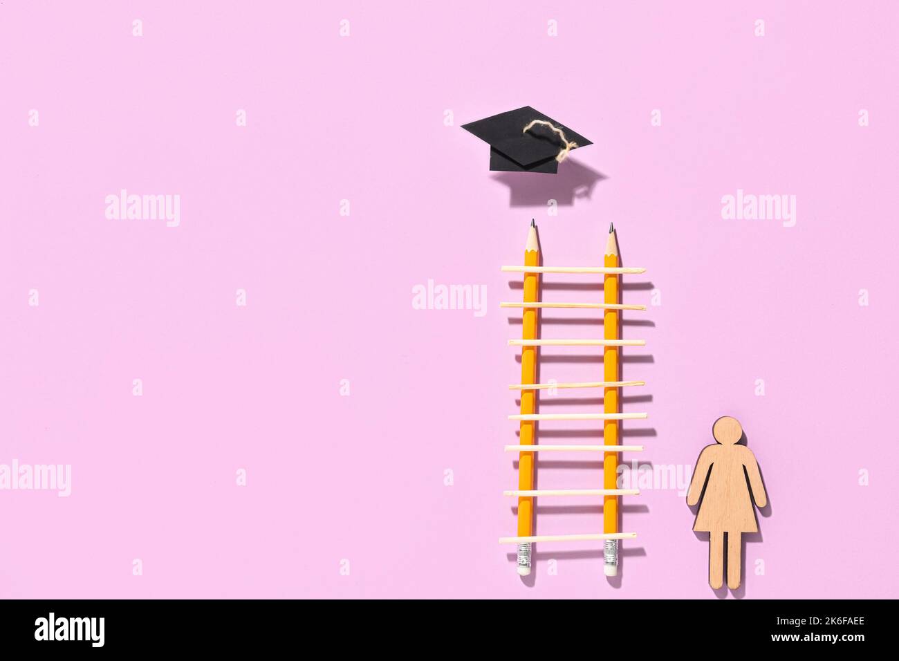Ladder, female silhouette and mortarboard on color background Stock ...