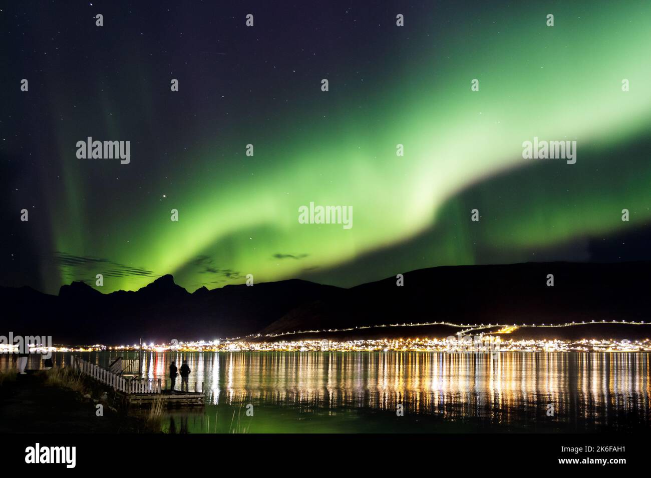The Northern Lights over the mountains in Norway during the stary night ...