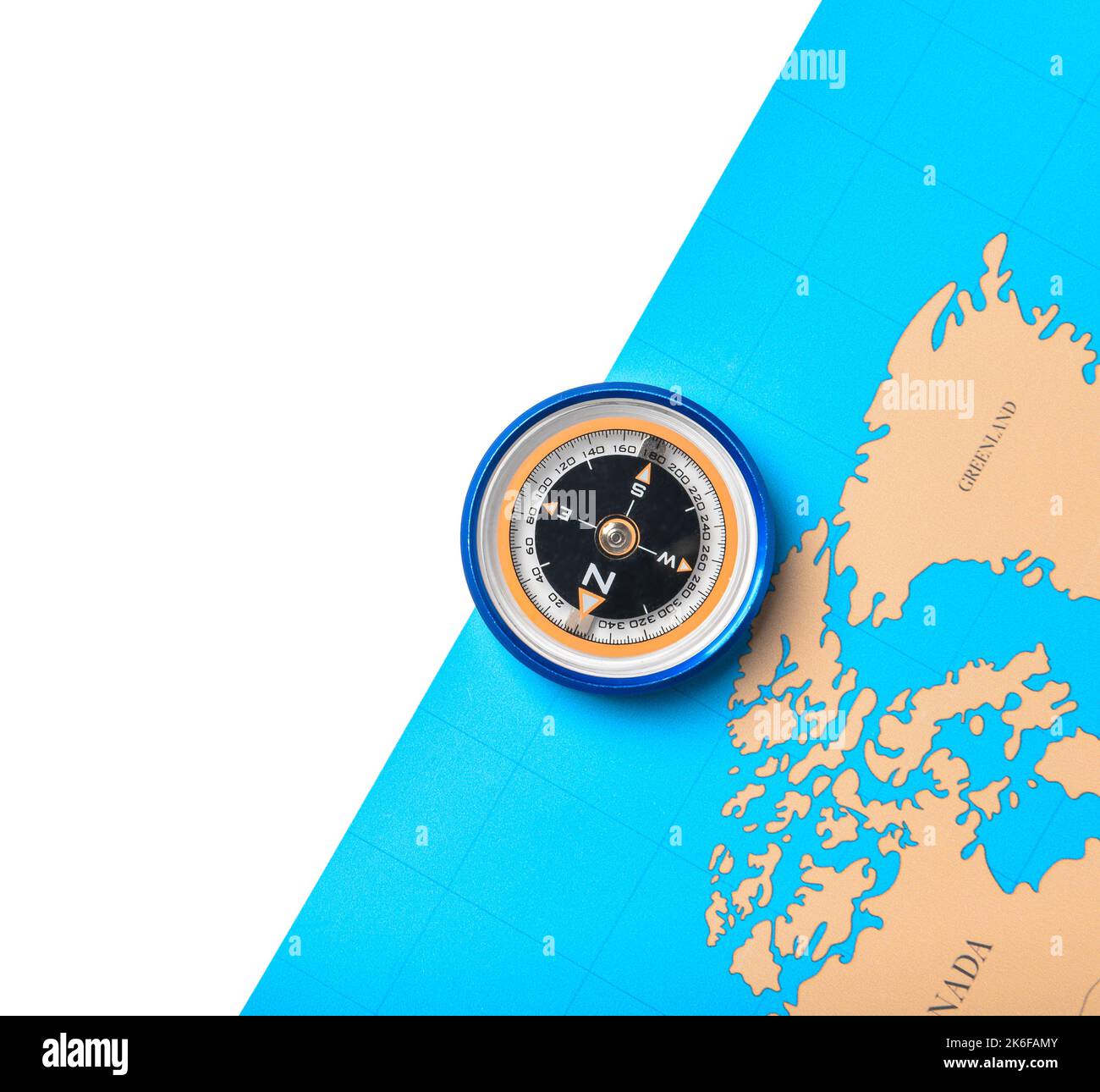 Compass and world map on white background, closeup Stock Photo - Alamy