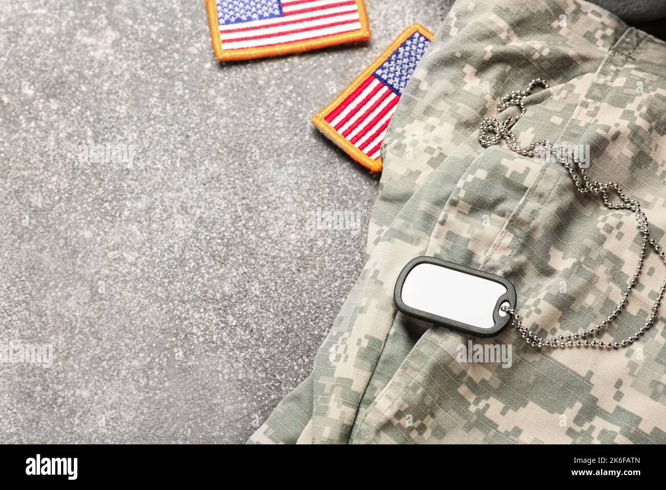 Military uniform, tag and chevrons of USA army on grunge background ...
