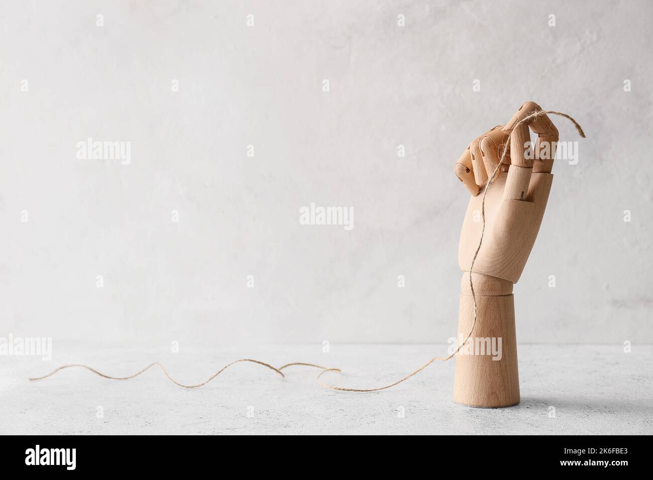 Wooden human figure rope hi-res stock photography and images - Alamy