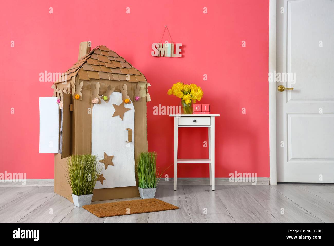 Interior of room with toy cardboard house in children's room Stock ...
