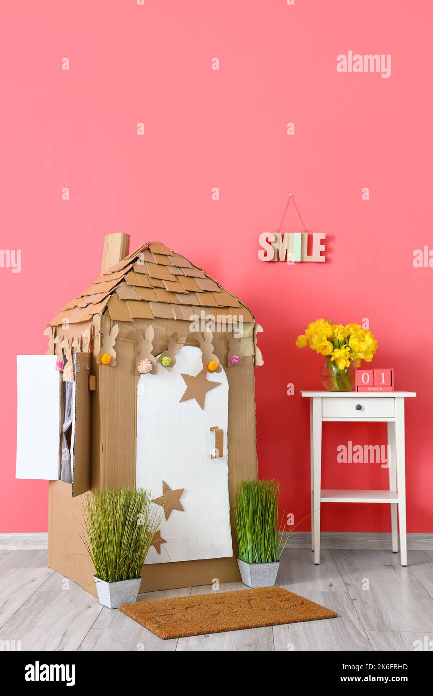 Interior of room with toy cardboard house in children's room Stock ...
