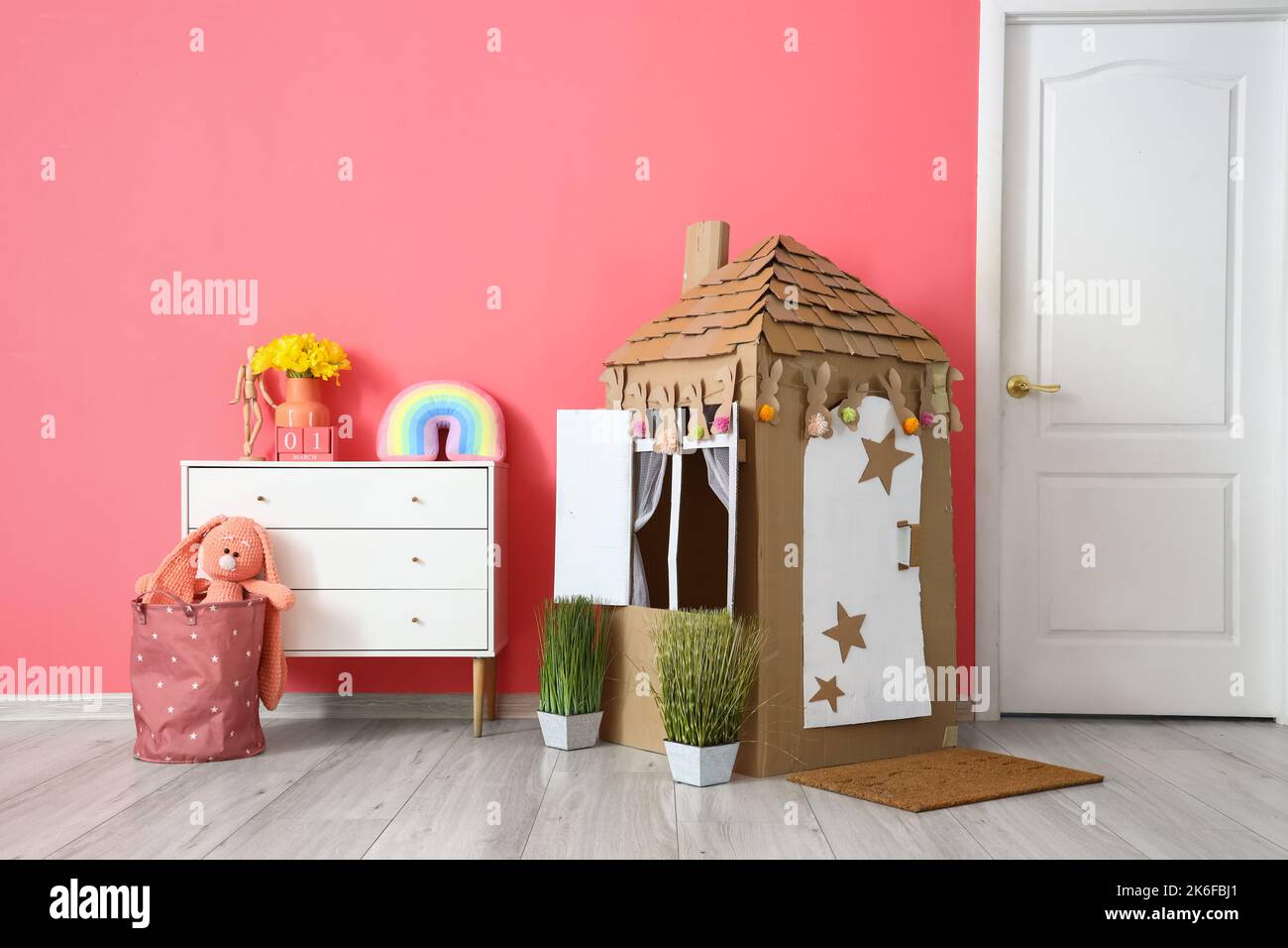 Interior of room with toy cardboard house in children's room Stock ...
