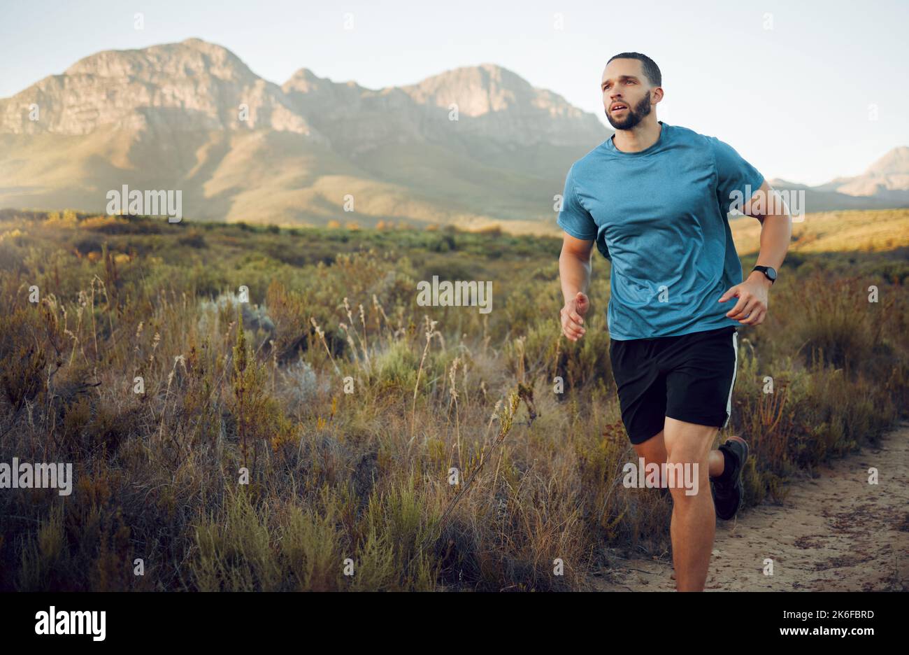 Fitness, mountain and man running in nature training for health ...