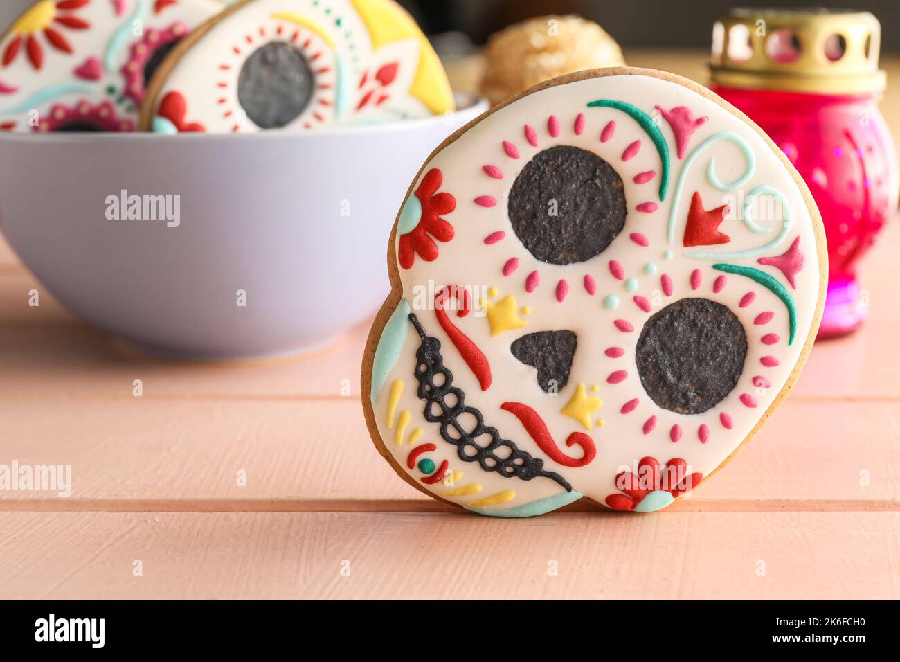 Skull shaped cookie on color wooden background, closeup. El Dia de ...