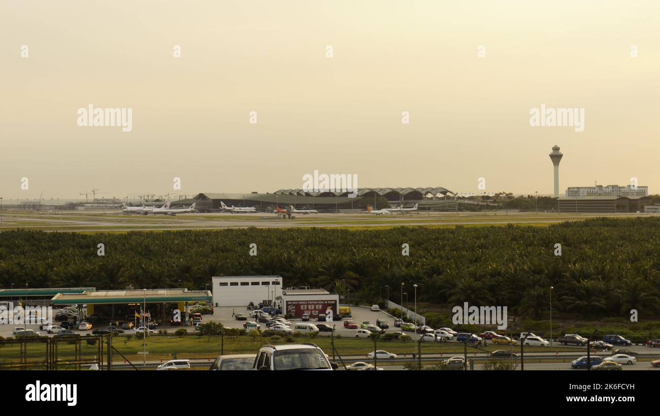 A Panaromic view of KLIA Airport from the Sepang hill with pink sky ...