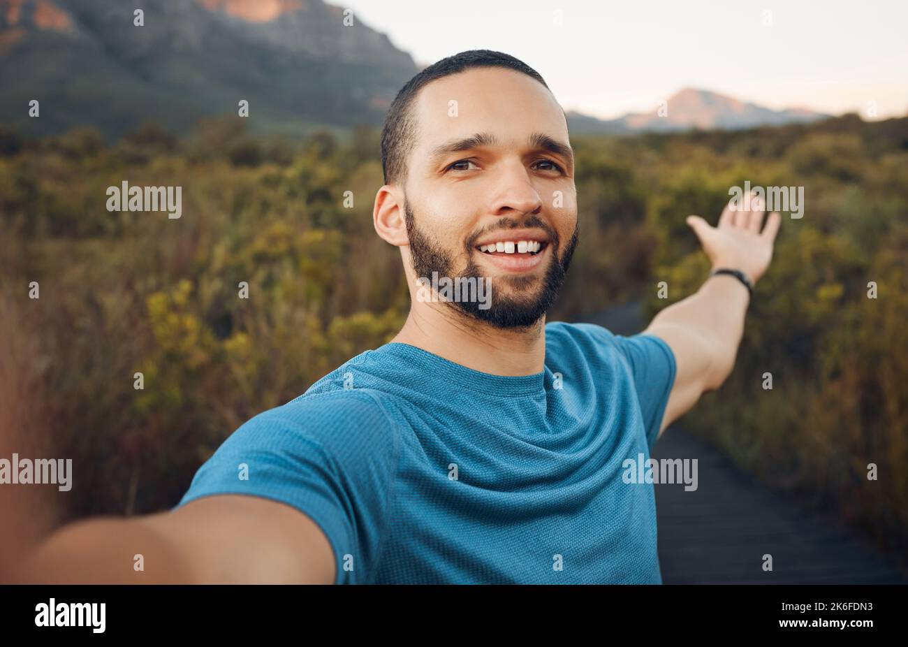 Fitness, running and man taking a selfie on mountain during outdoor run ...