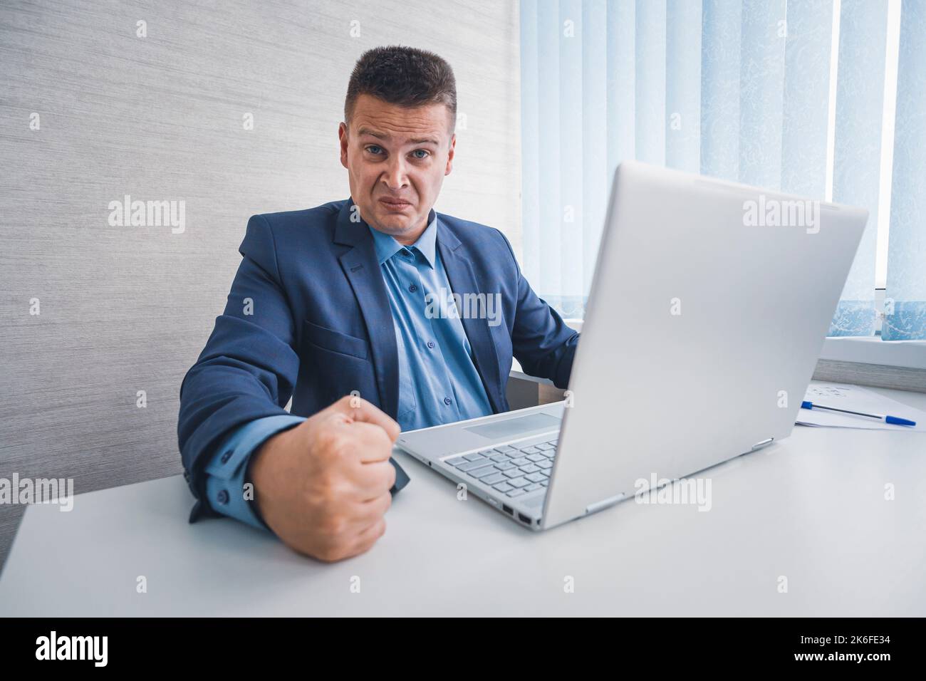 Dealing with anger at work. man feel anger at work. Businessman show ...