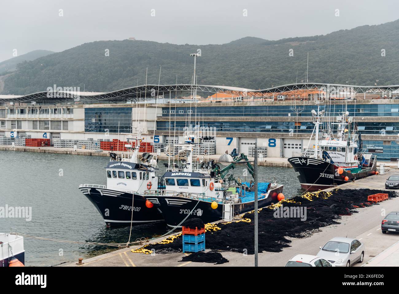 Santona, Spain - August 13, 2022: The port with fishing boats a cloudy ...