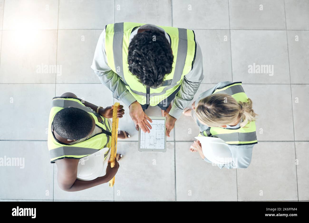 Top view, tablet blueprint or architect teamwork in building planning ...