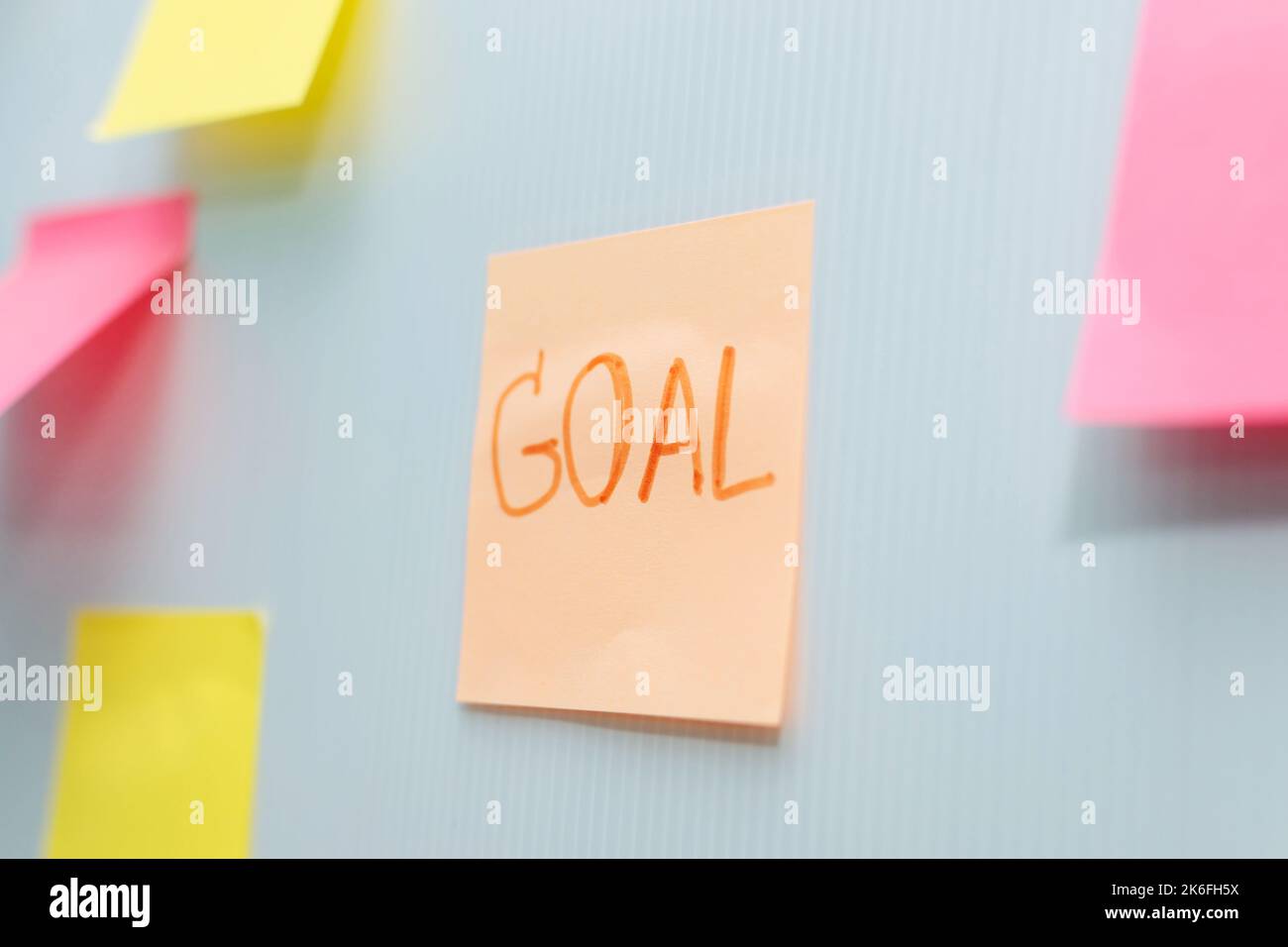 Marketing plan. many colored sheets sticky note paper on white board ...