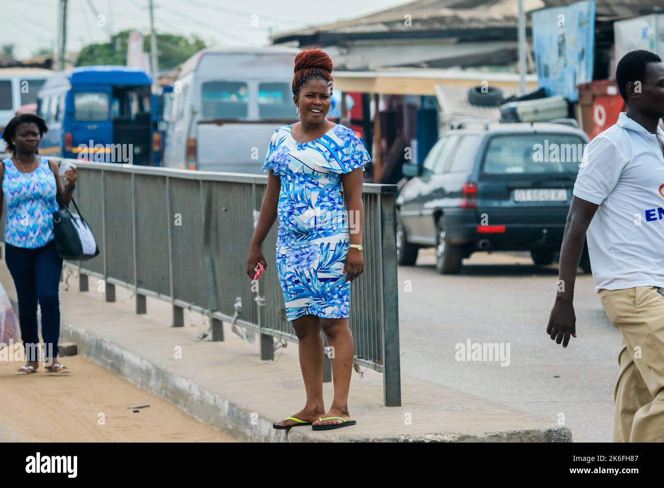 Accra, Ghana - April 06, 2022: Local African Ghana People walking to ...