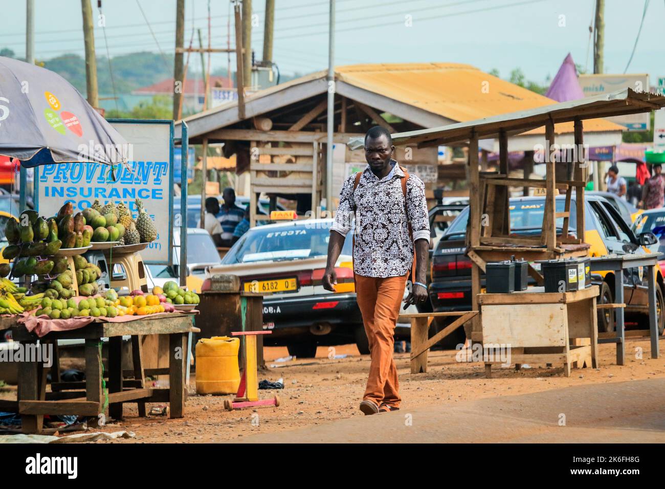 Accra, Ghana - April 06, 2022: Local African Ghana People walking to ...