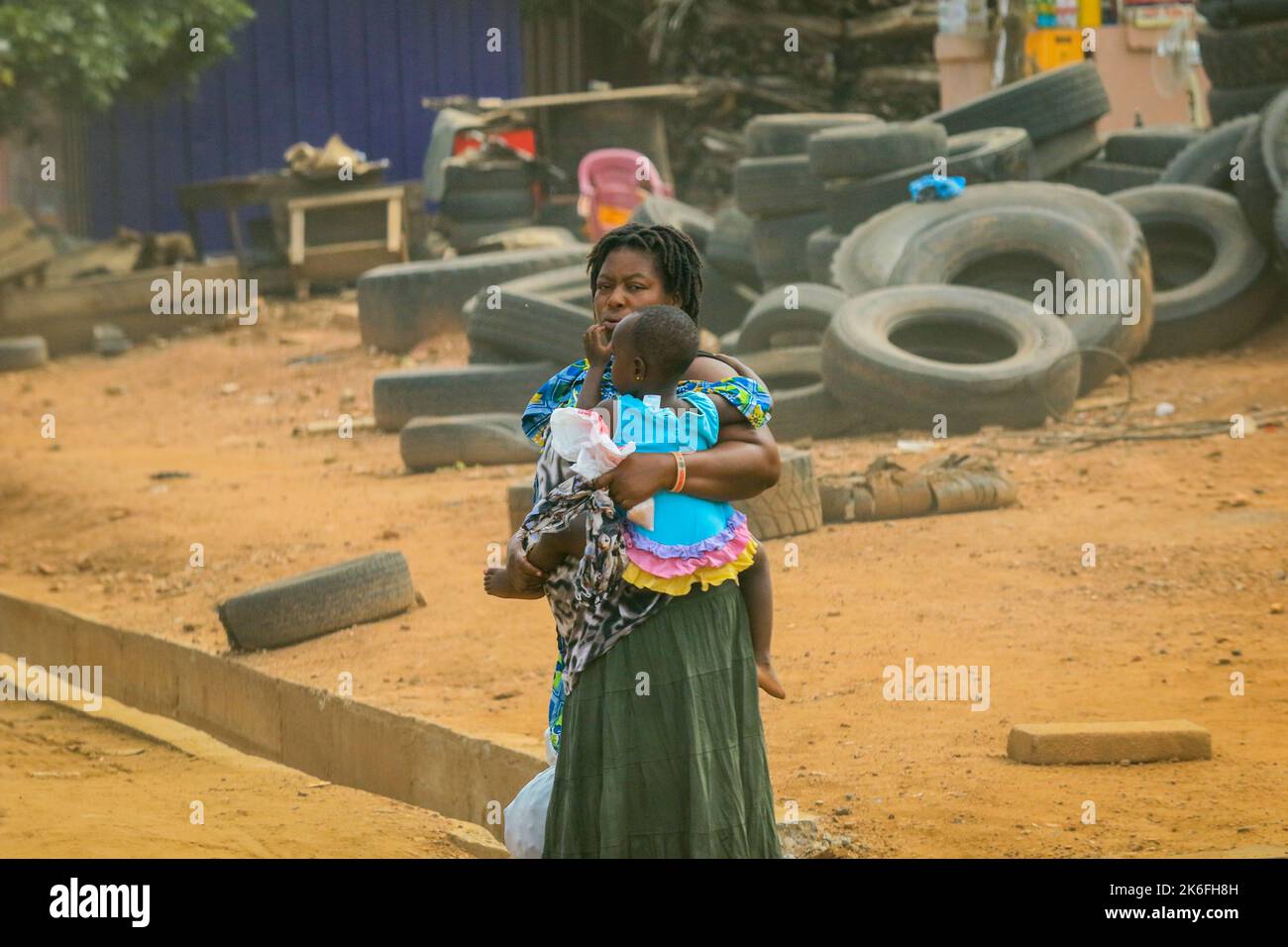Accra, Ghana - April 06, 2022: Local African Ghana People walking to ...