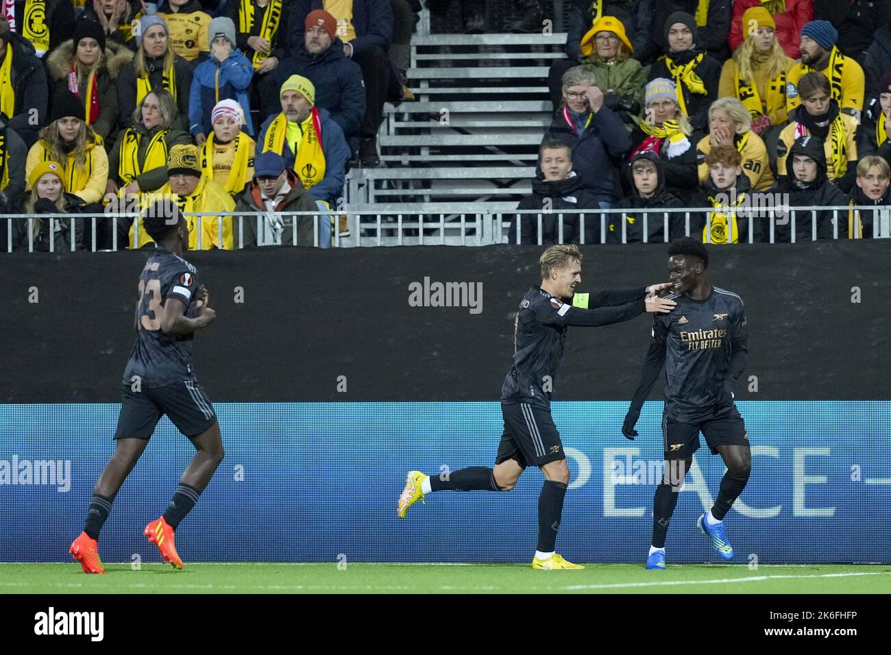 Bodø 20221013.Arsenal's Bukayo Saka celebrates together with Martin ...