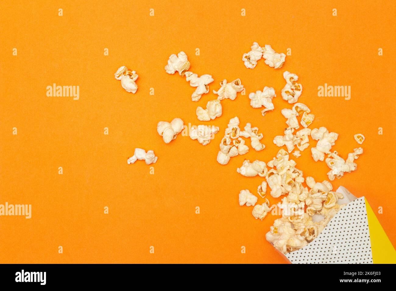 Snack of watching movie concept, Sweet popcorn float out from paper cup ...