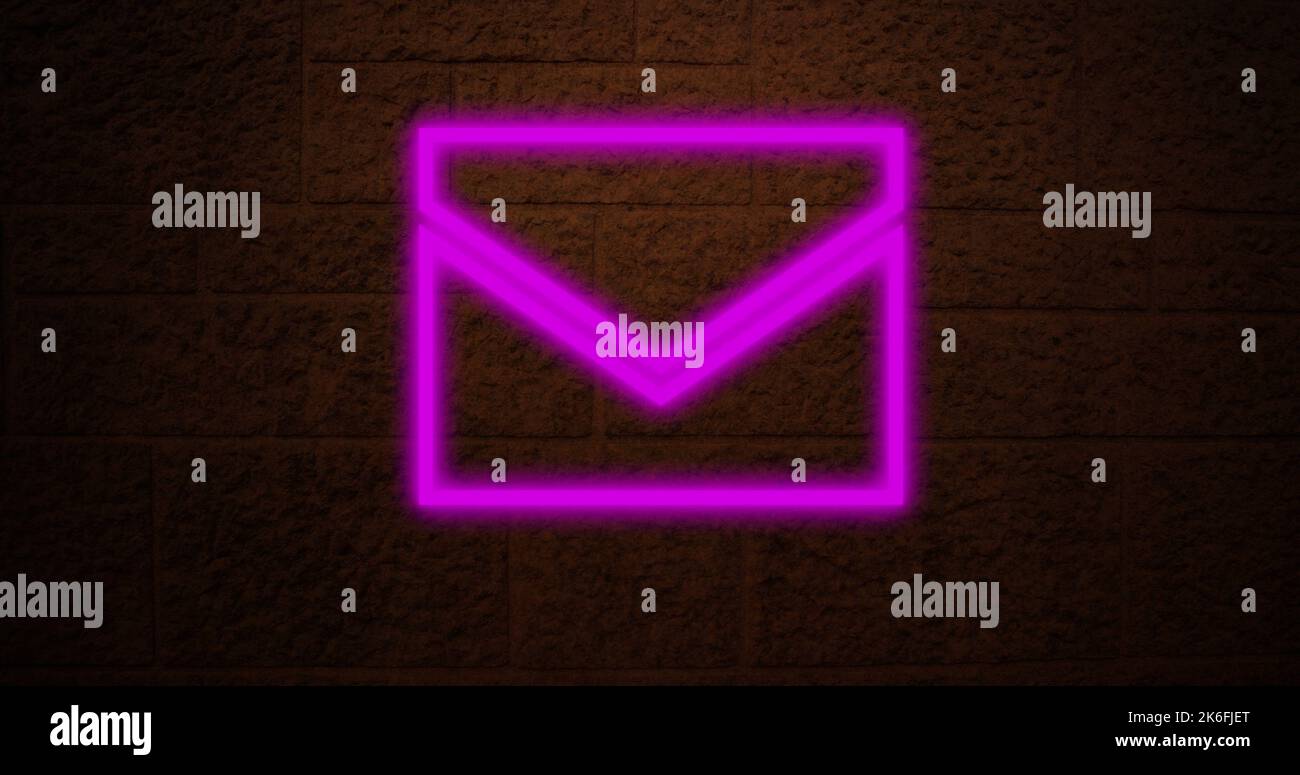 Image of neon email symbol over brick wall. Social media, communication ...
