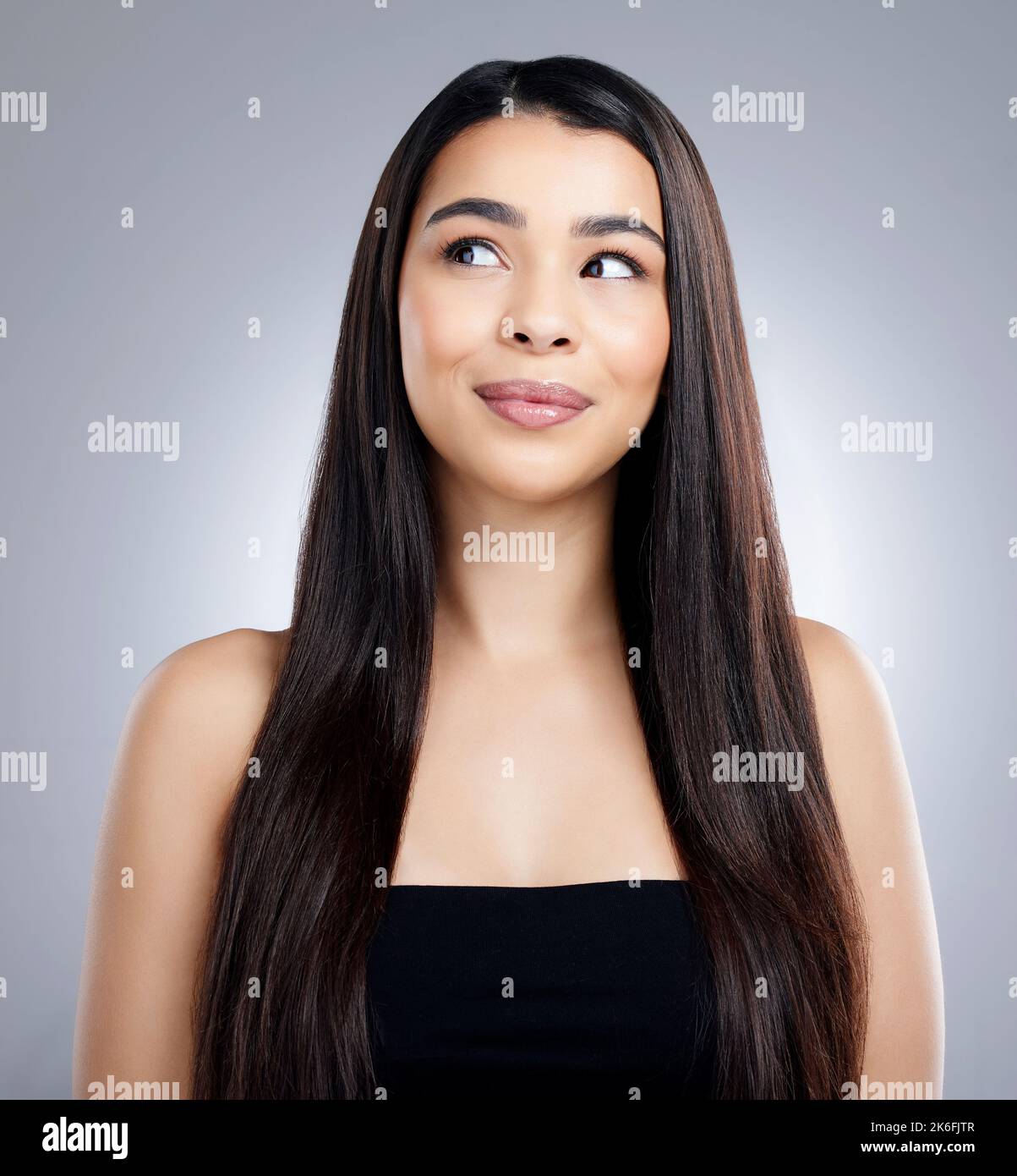 I spy a good hair day coming along. Studio shot of an attractive young ...
